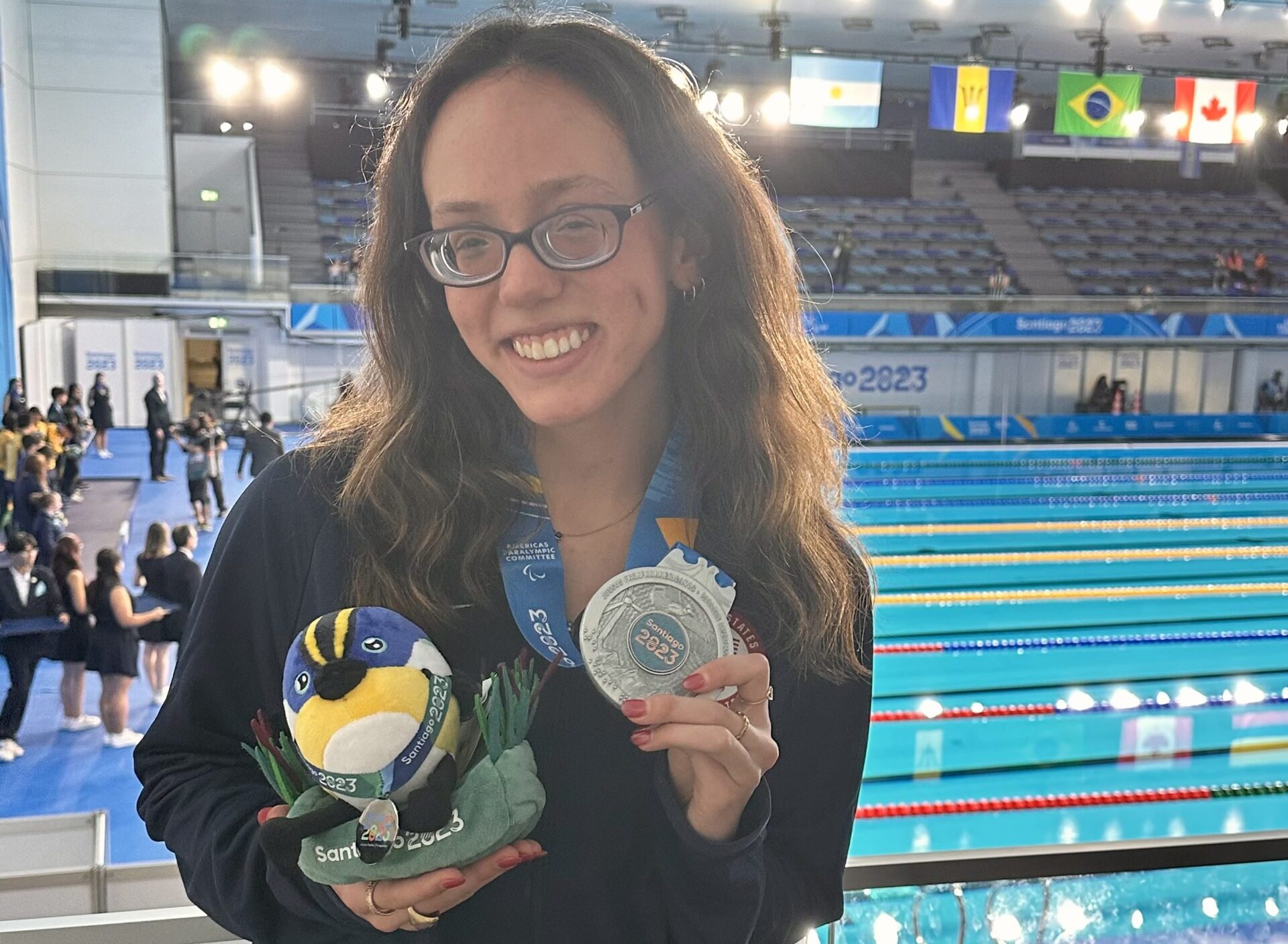 Unsinkable college athlete swims against the odds toward Paralympic ...